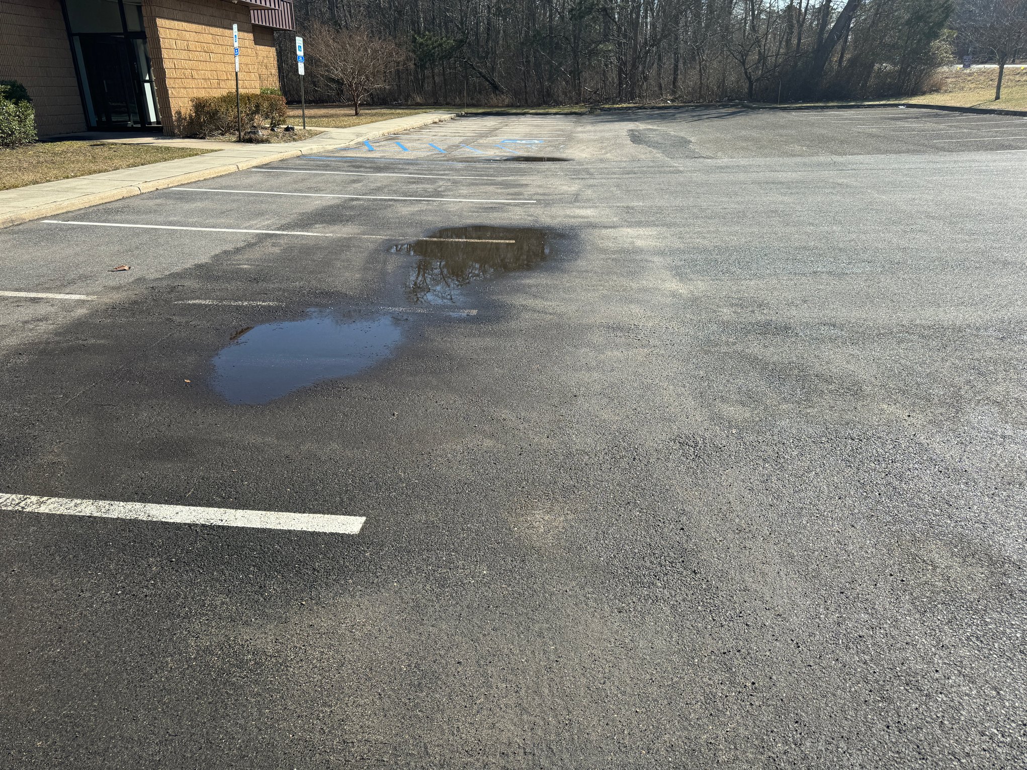 The Crucial Step Before Repaving Your Parking Lot:Post-Rain Inspection