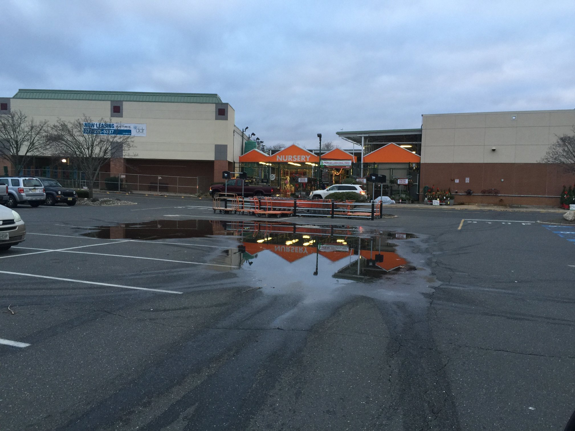 💧 How to Fix Standing Water in Your Parking Lot (Without Tearing It Up)